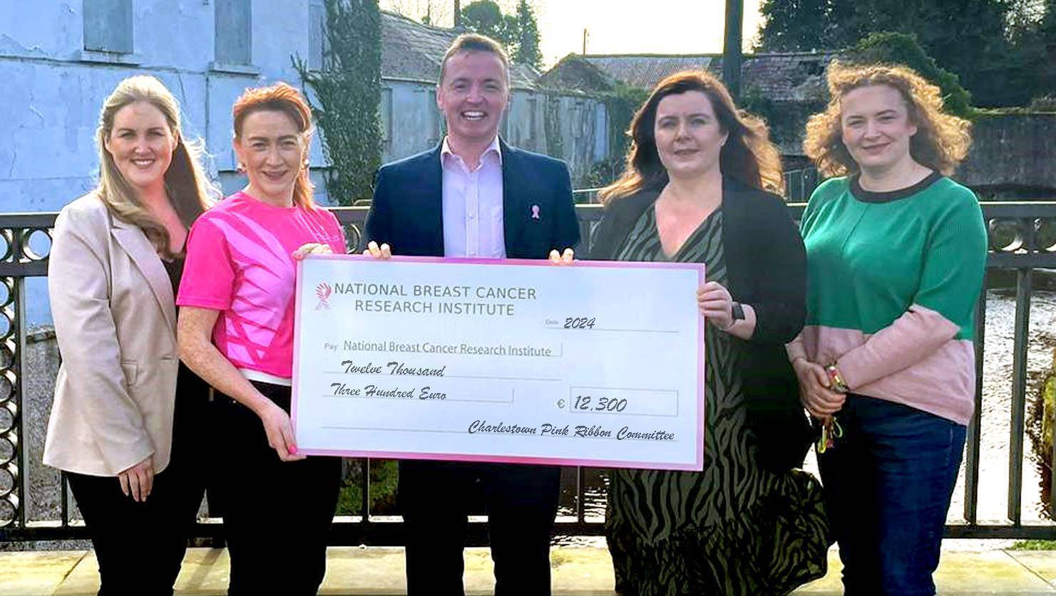Local Notes: Charlestown 'Pink Ribbon' fundraiser present cheque to ...